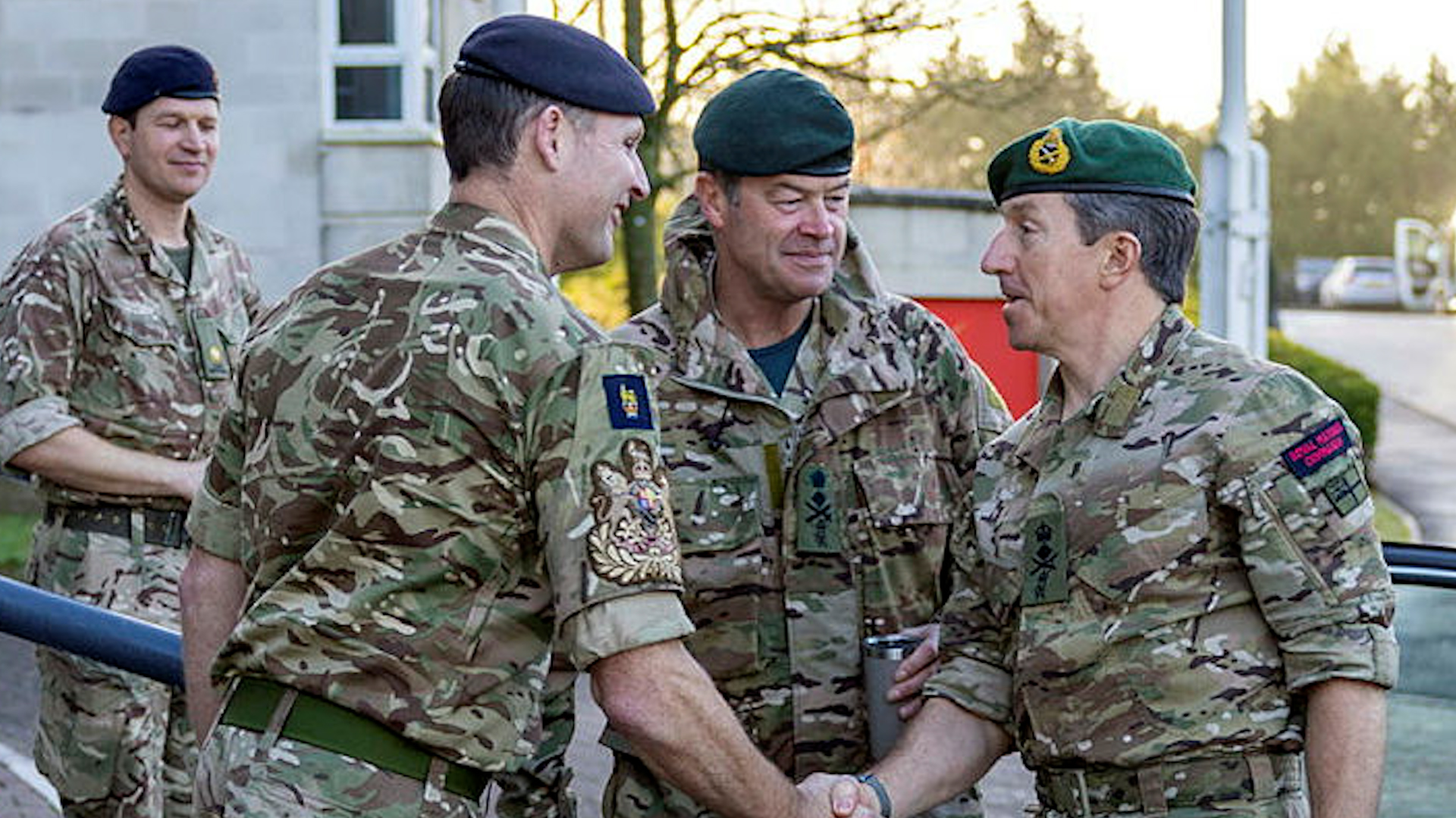 Senior Royal Marines officers swap general staff Army cap badges for new woven version